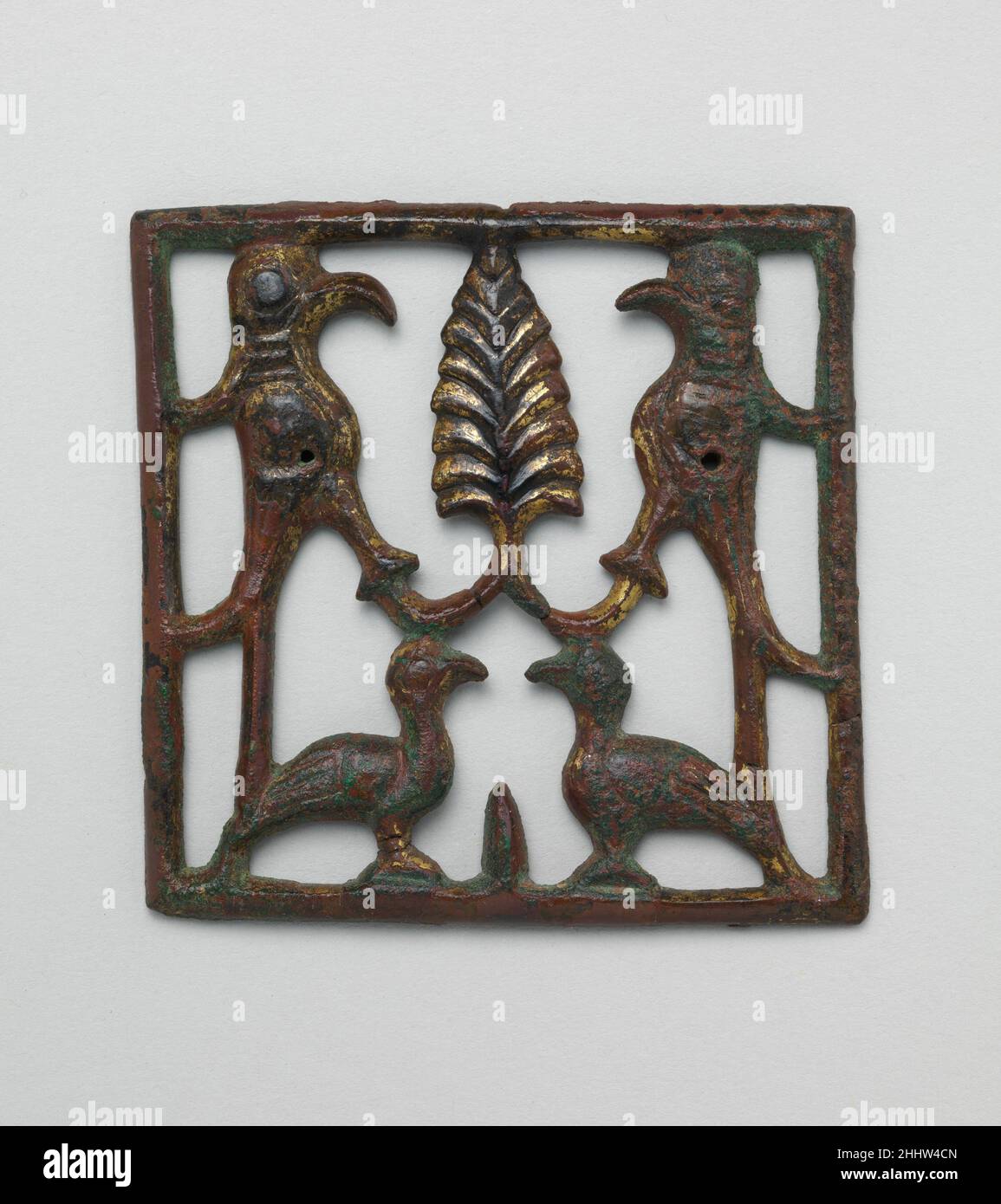 Appliqué Plaque with a Tree and Four Birds 12th century This small but ...