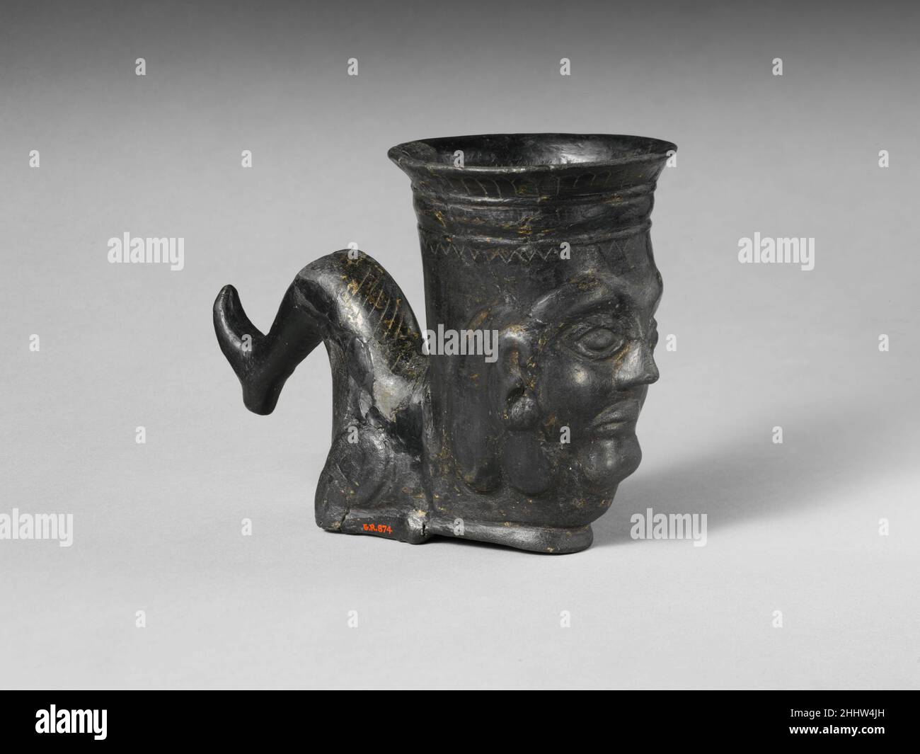 Terracotta vessel in the shape of a bent leg ca. 550–500 B.C. Etruscan ...