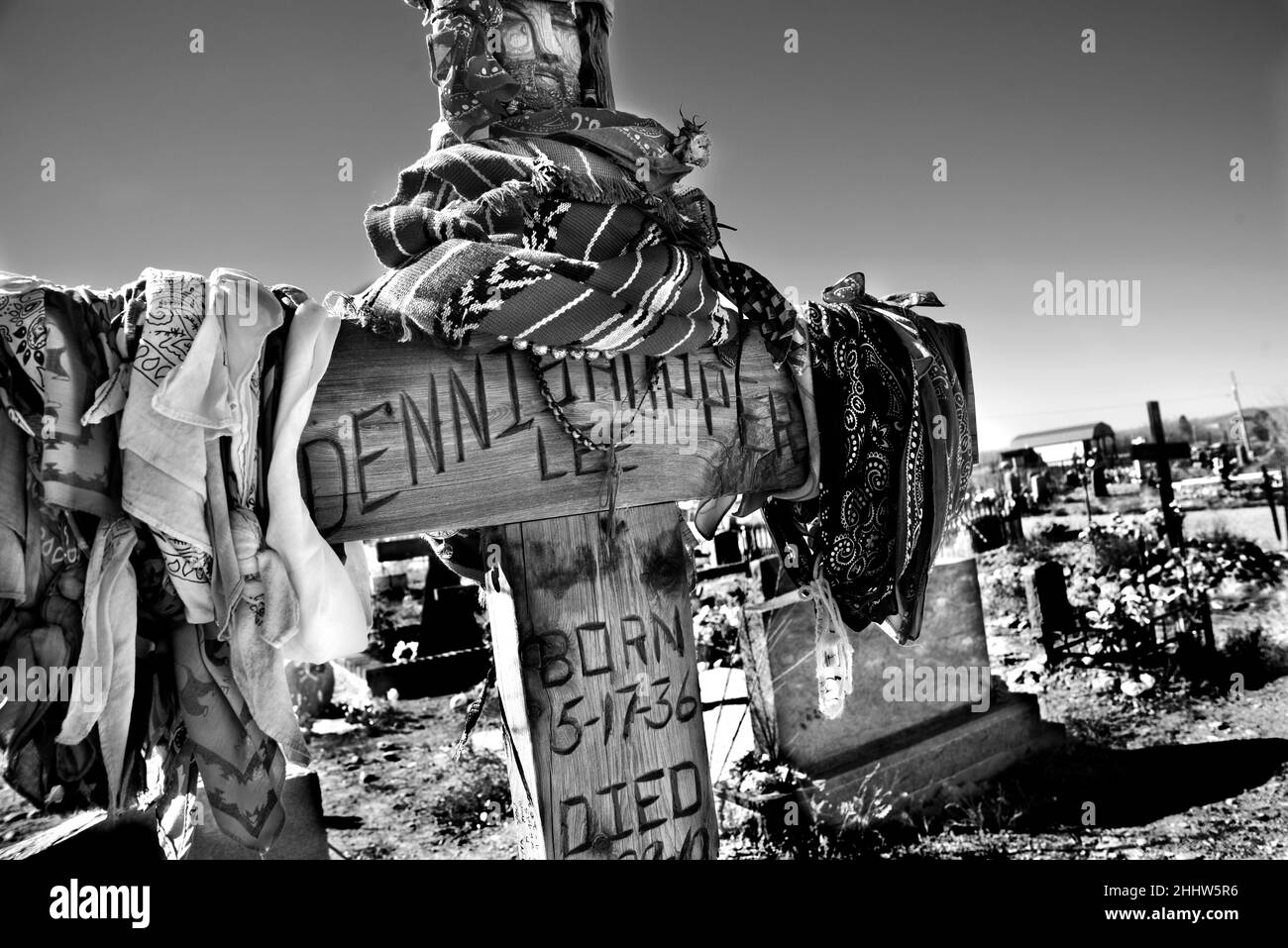 The grave with handmade wooden cross of American film actor Dennis ...