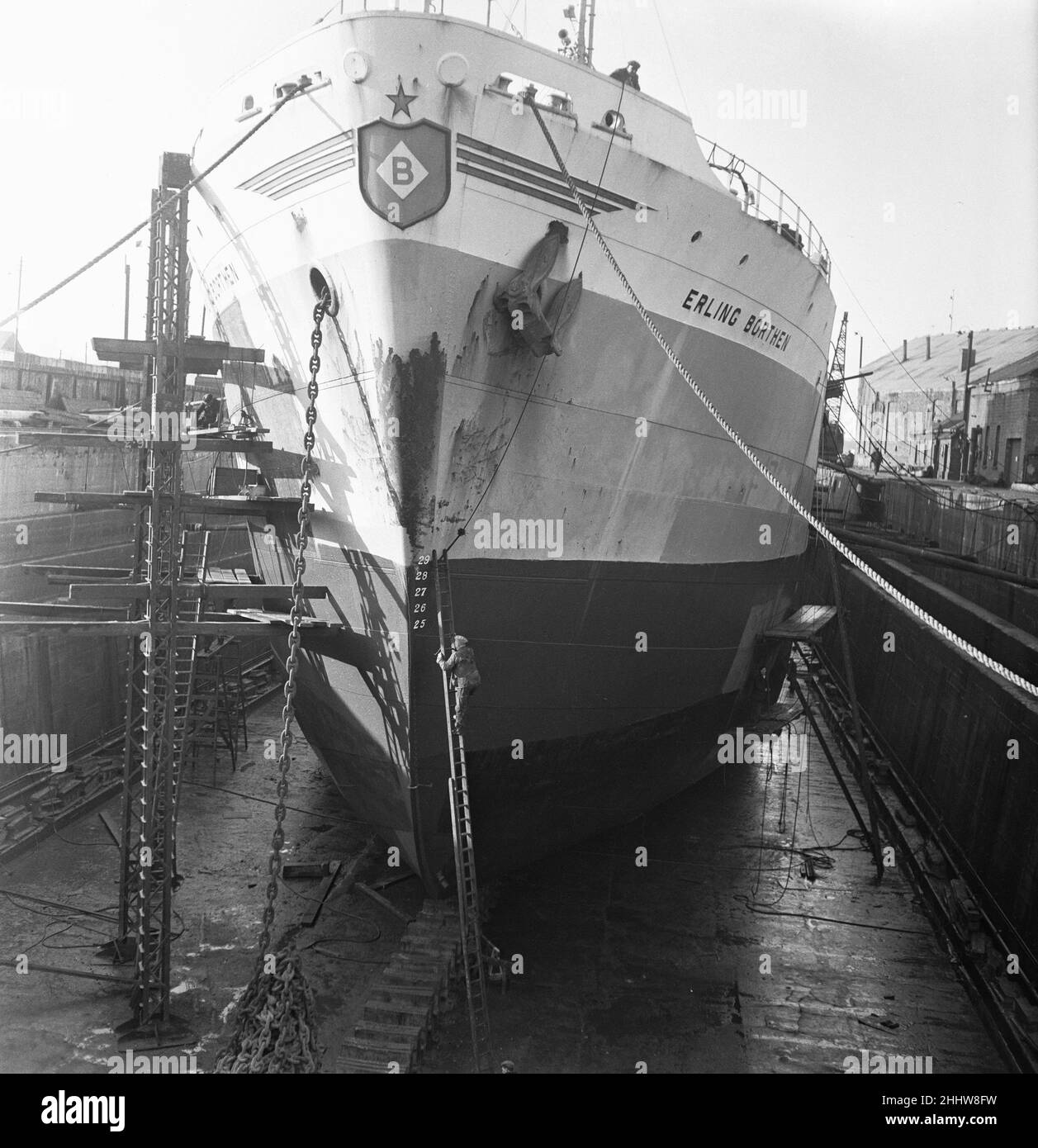 Watermark painter Mr Arthur Hainis in one of Cardiff's dry docks ...