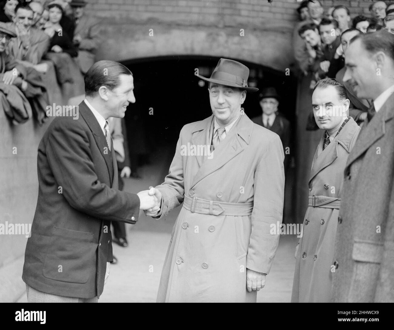 Chelsea Manager Ted Drake (left) shakes hands with the 1,000,000th ...