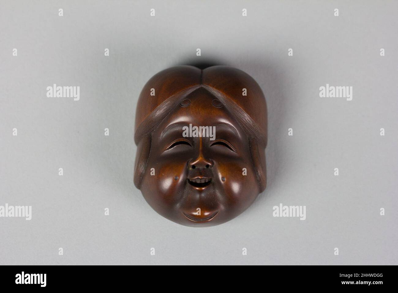 Netsuke of Noh mask; Face of Usume 19th century Japan. Netsuke of Noh ...