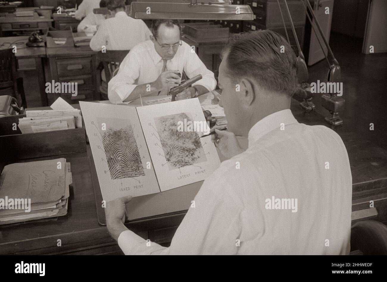 FBI analysts working in the FBI Criminal Files Section - 1957 ...