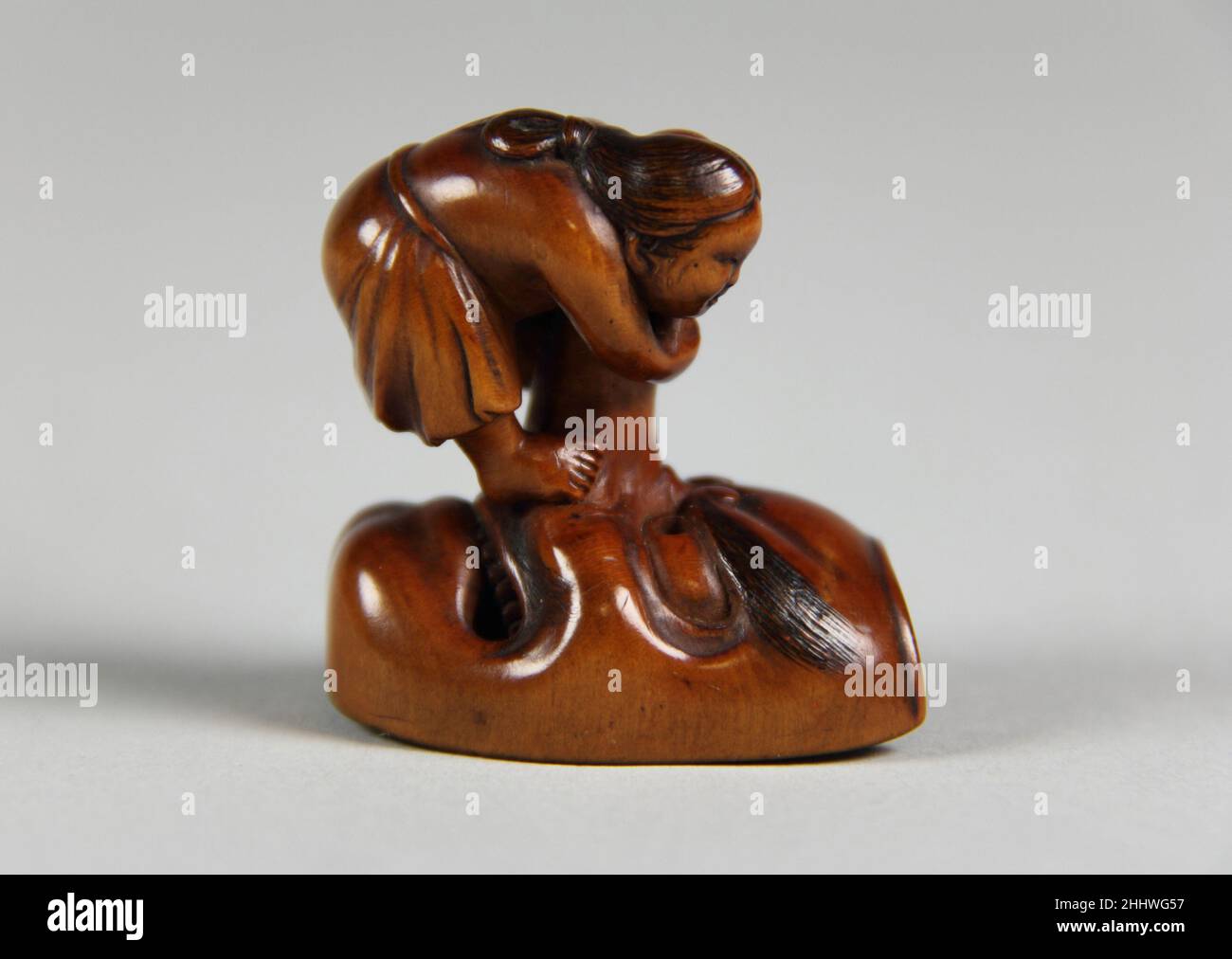 Netsuke of Mask; Uzume (Okame) and a Tengu mask 19th century Japan ...