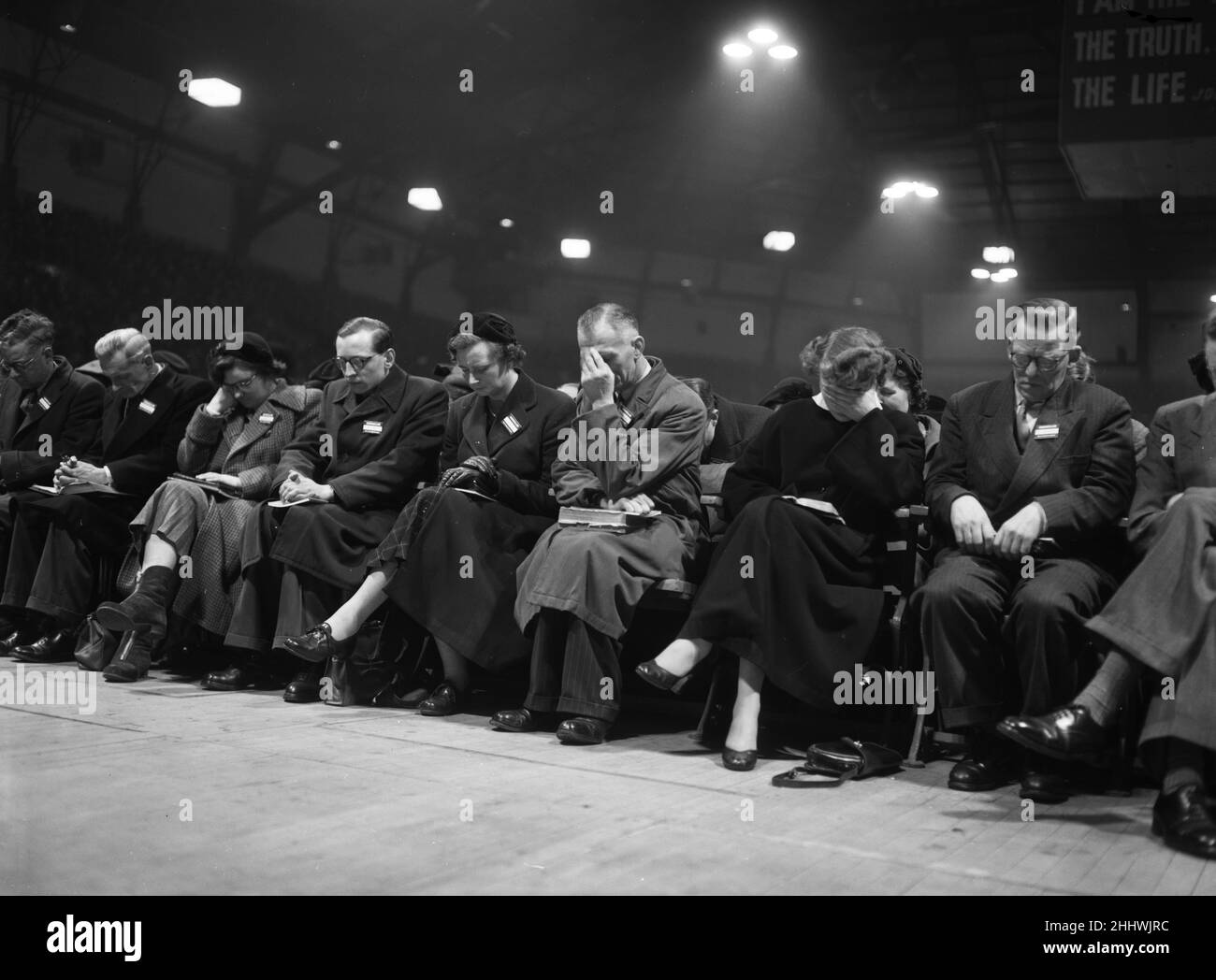 American evangelist Billy Graham speaks to the crowd at the Harringay ...
