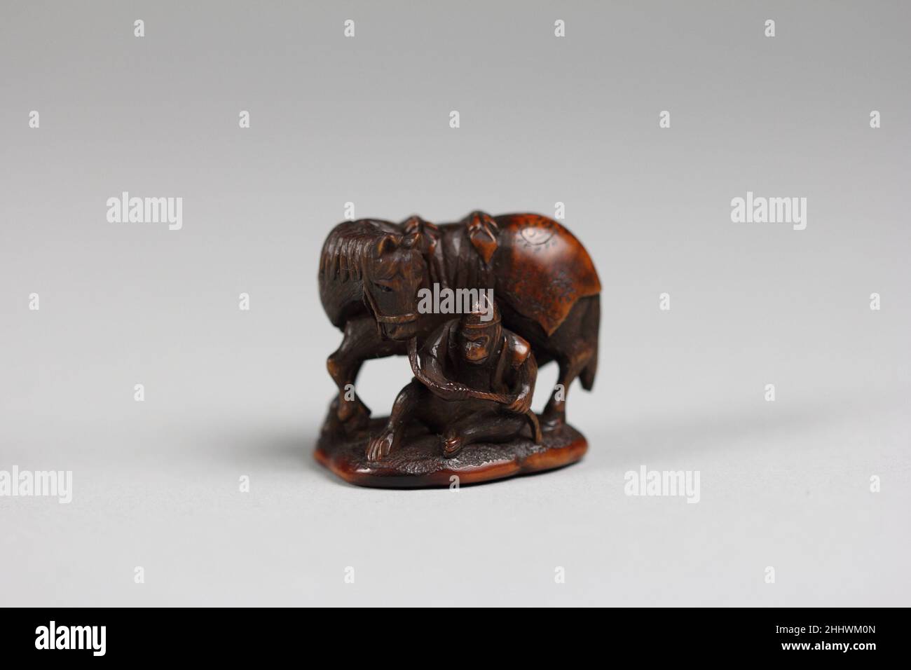 Netsuke of Monkey Holding Horse Rein 19th century Japan. Netsuke of ...