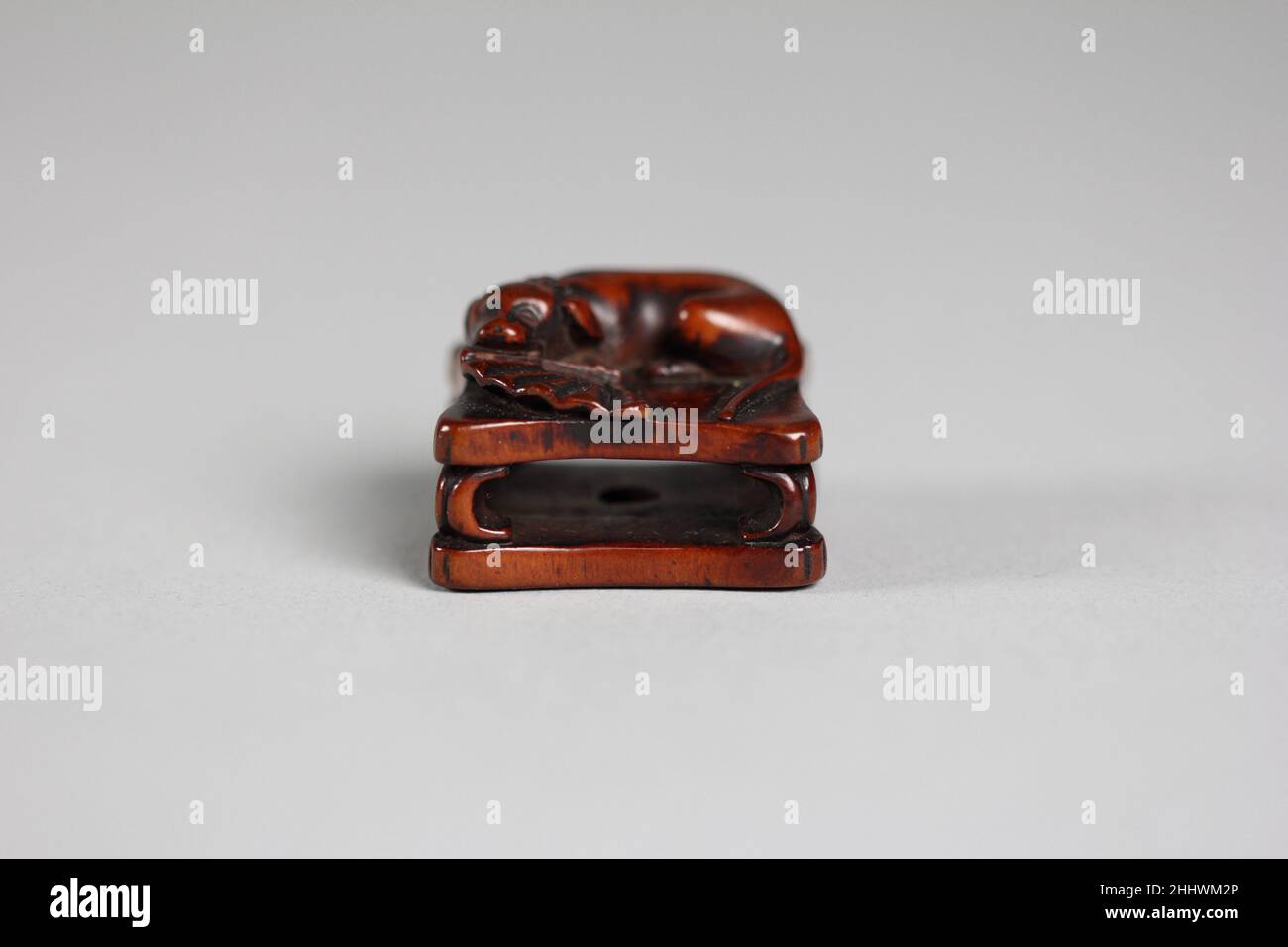 Netsuke of Dog and Fan on a Bench 19th century Japan. Netsuke of Dog ...