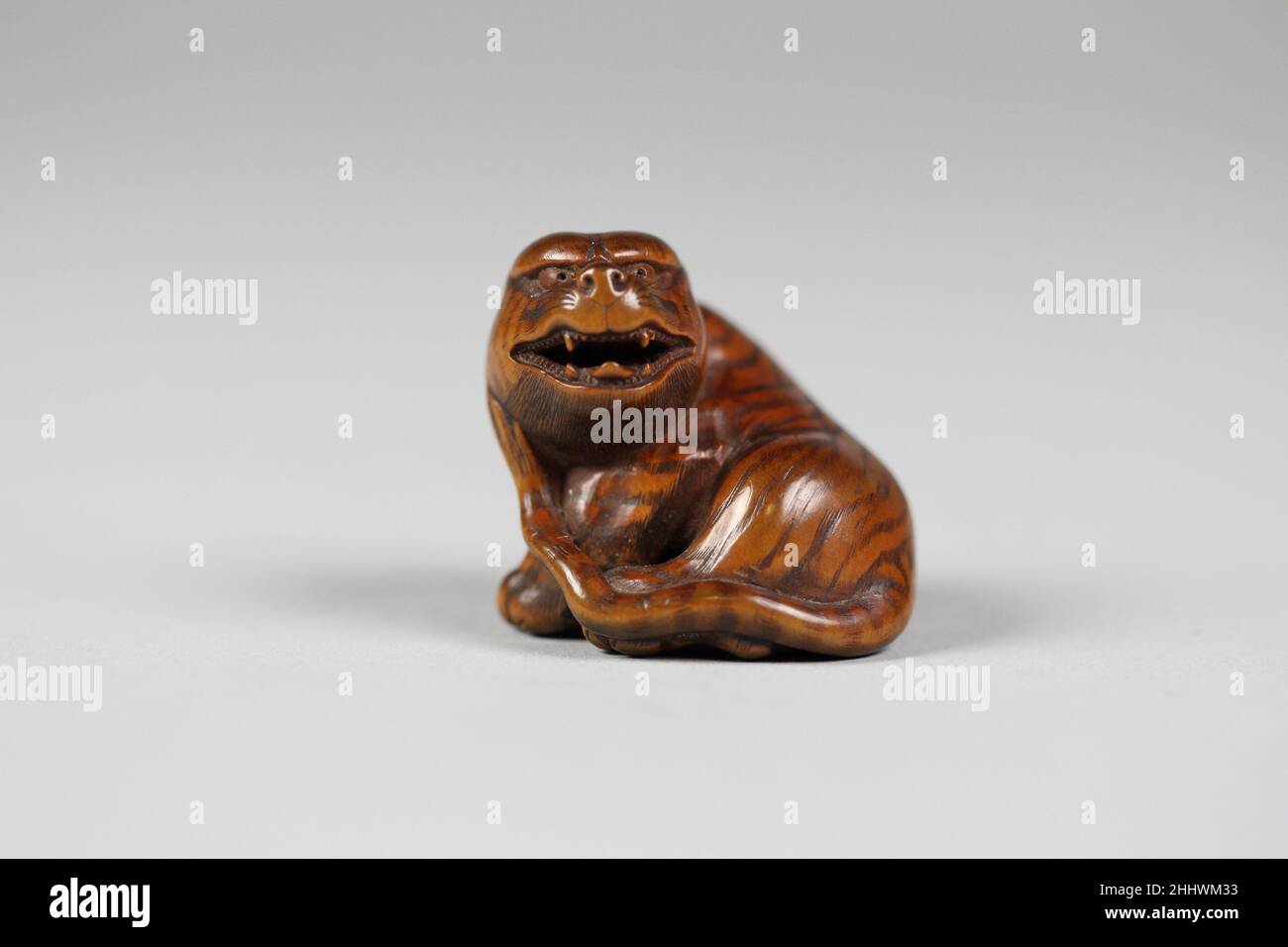 Netsuke of Tiger with Head Turned, Snarling 18th century Japan. Netsuke ...