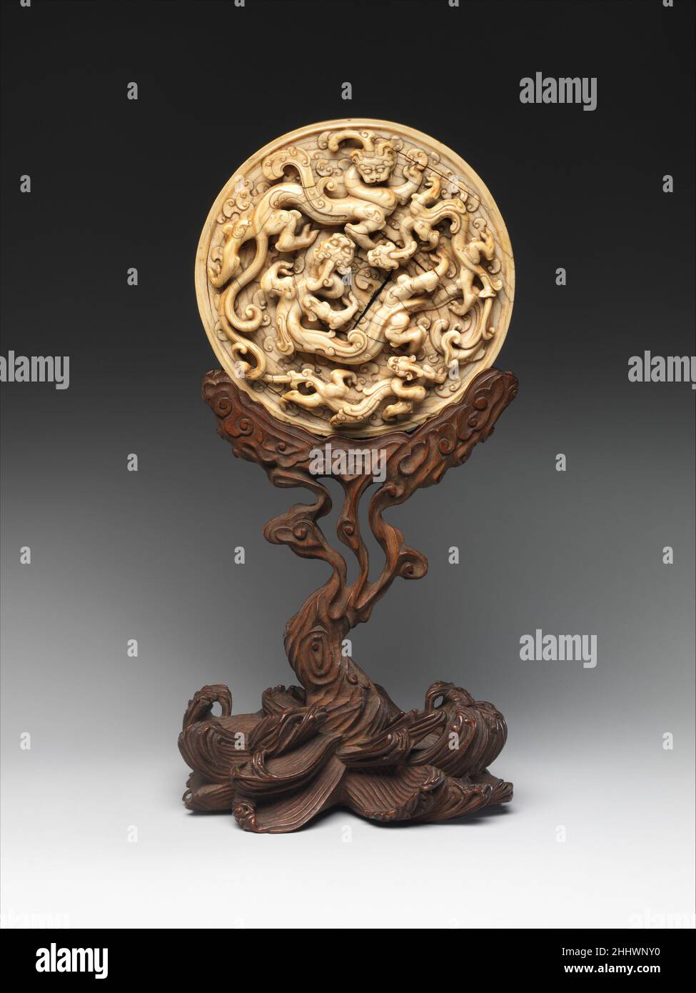 Disk with dragons 14th–early 15th century China This disc either may ...