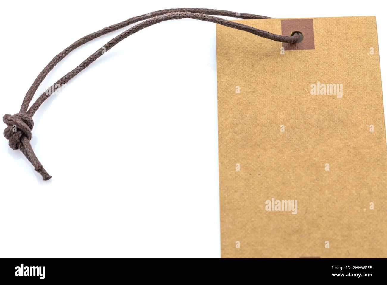 Brown blank tag isolated on white background Stock Photo - Alamy