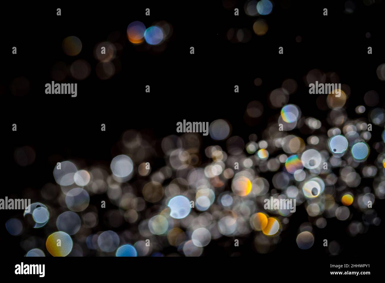 Abstract bokeh texture on black background Stock Photo - Alamy