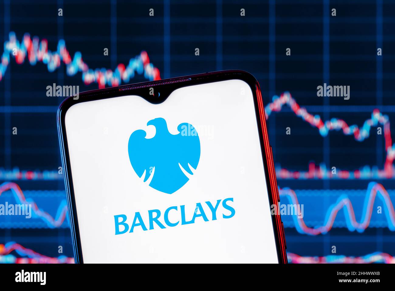Smartphone with Barclays bank logo. Barclays stock chart on the ...