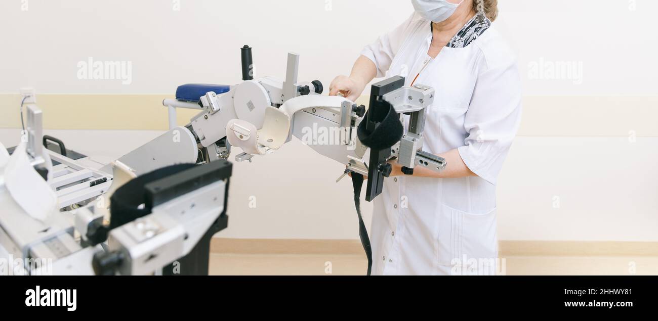 Patient on Continuous Passive Range of Motion machines. Device to ...