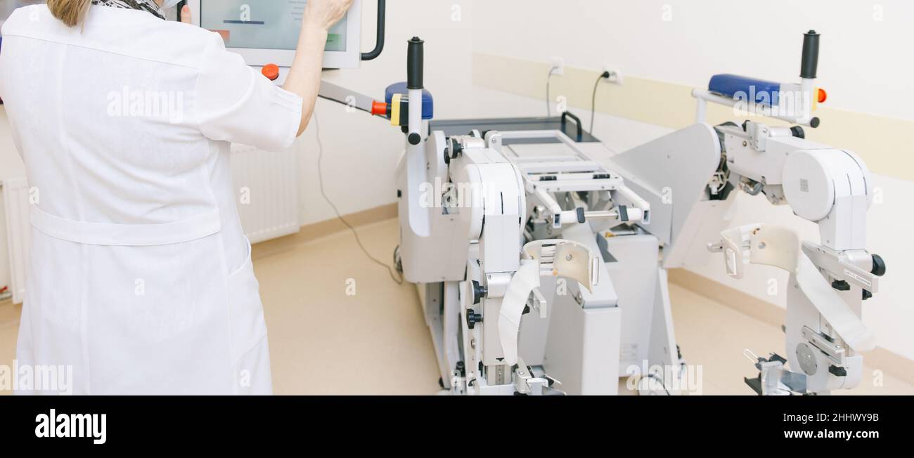 Patient on Continuous Passive Range of Motion machines. Device to ...