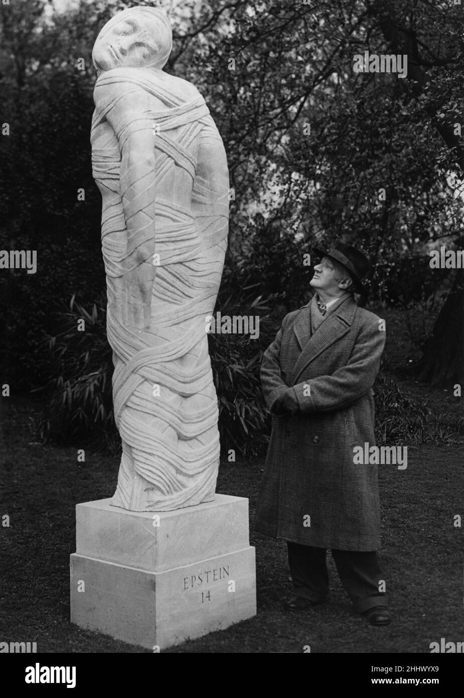 Sculptor Jacob Epstein seen here with one of his works. Circa December ...