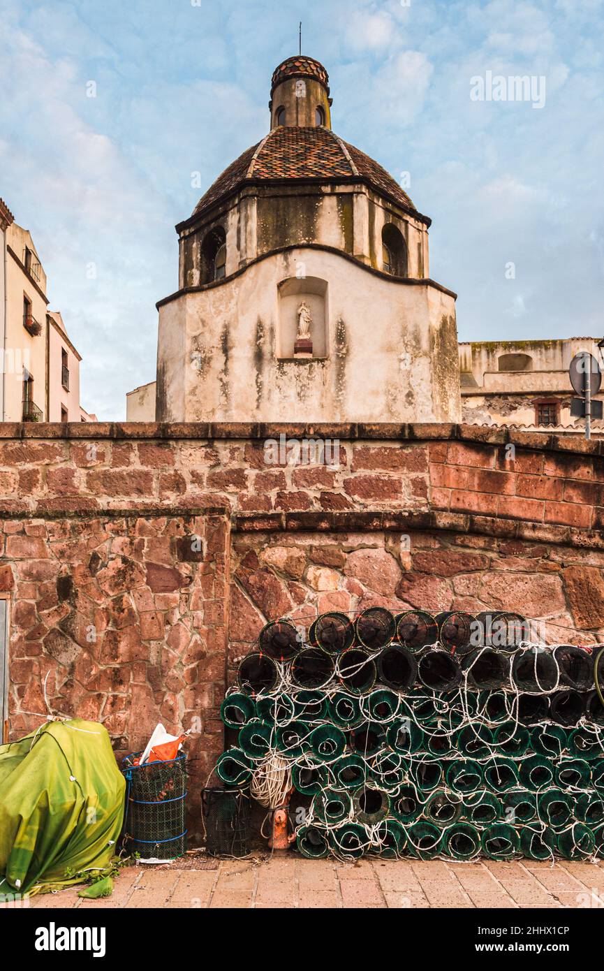 The traditional fishing equipment is seen stored on the quay in front ...