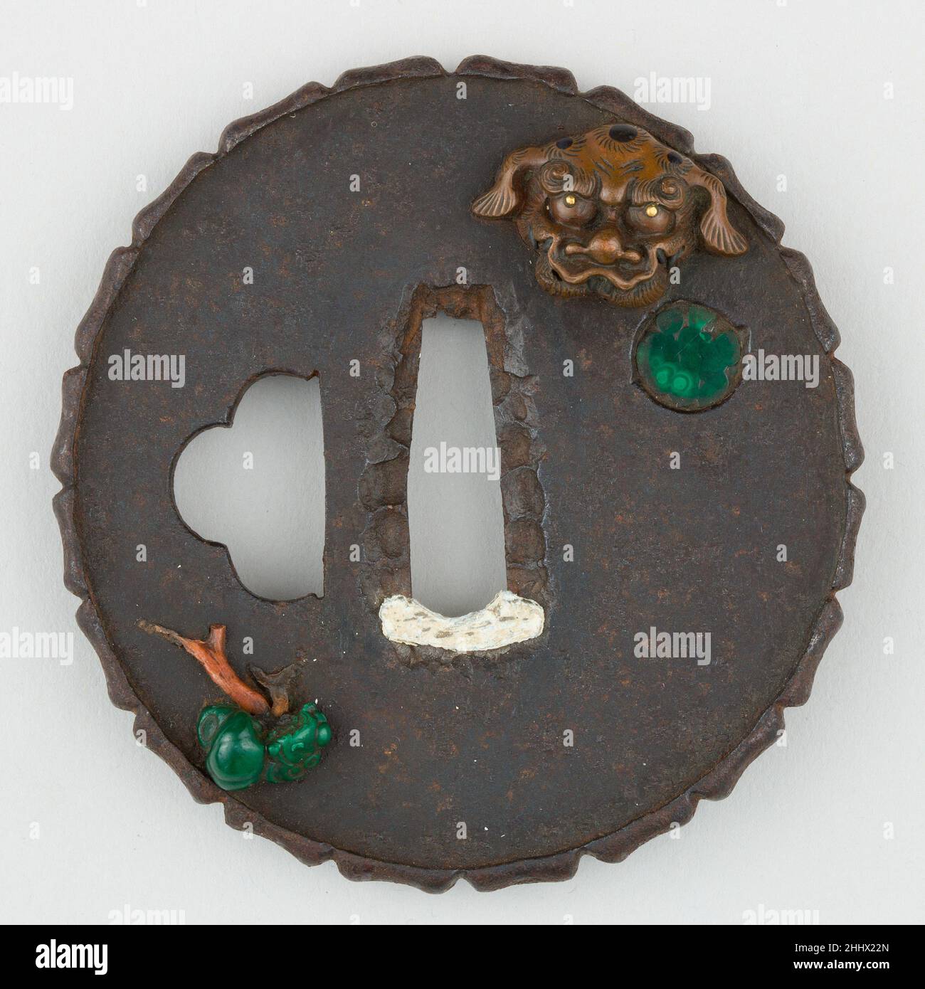 Sword Guard (Tsuba) Depicting an Arrangement of Masks (面散図鐔) ca. 1615 ...