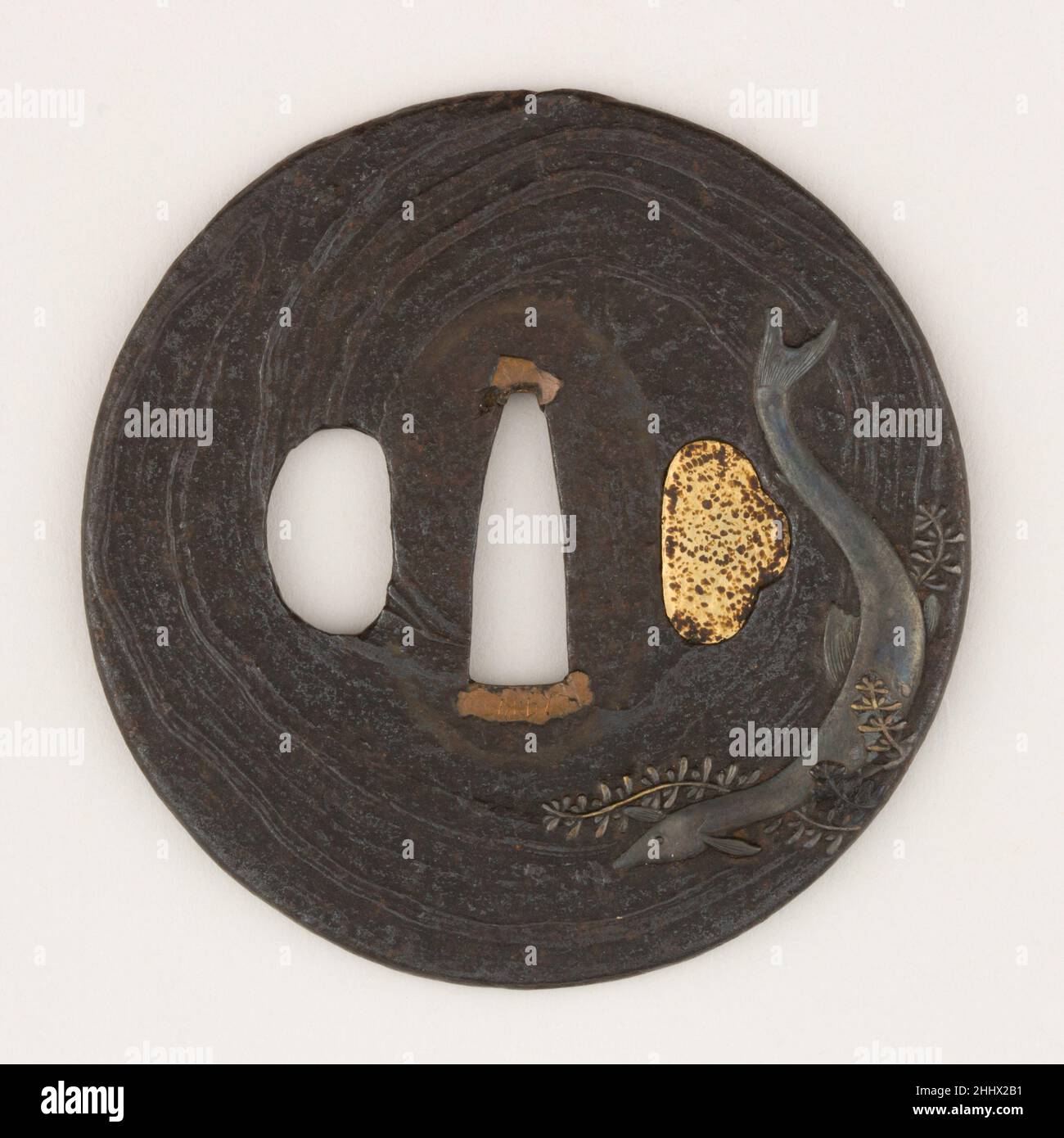 Sword guard (Tsuba) Depicting Icefish Between Seaweed (藻に白魚図鐔) ca. 1615 ...
