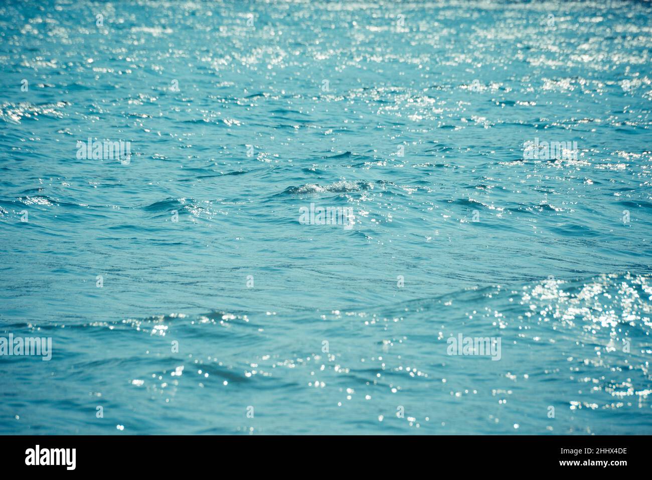 Blue waves on ocean surface background Stock Photo - Alamy