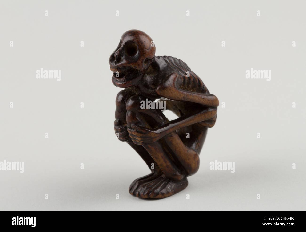 Netsuke of Crouching Figure of a Skeleton 19th century Japan. Netsuke ...