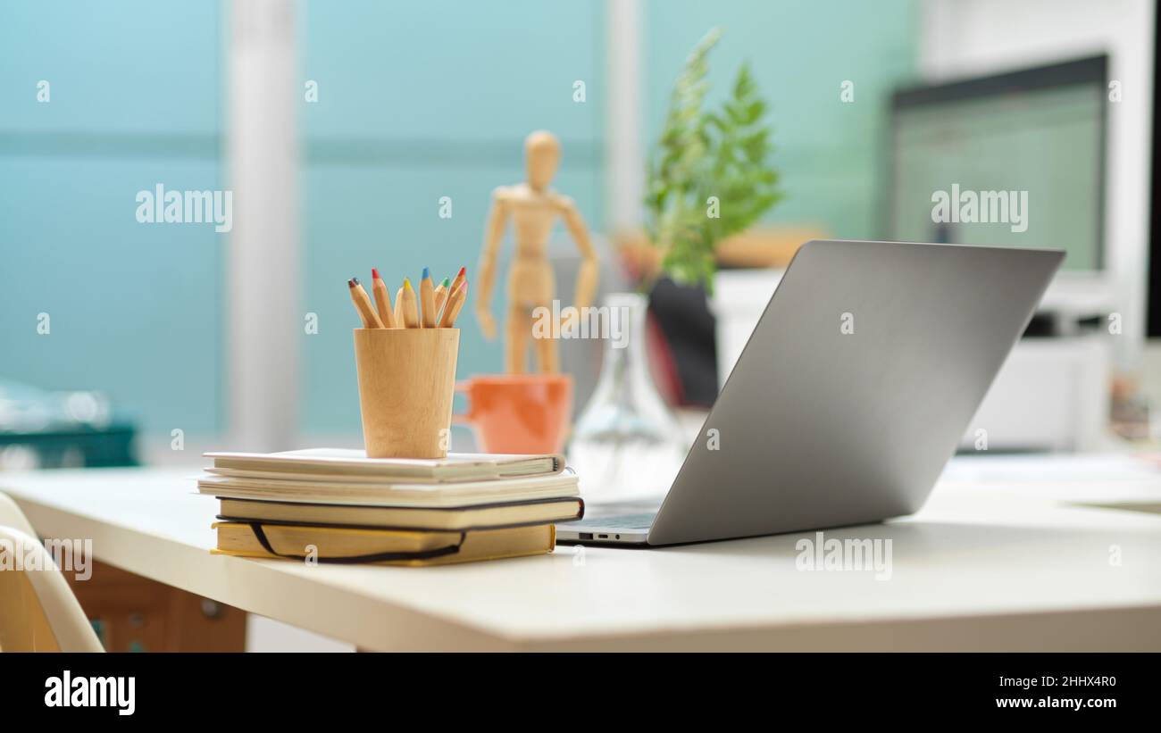 Close-up, Modern office workstation with portable laptop computer ...