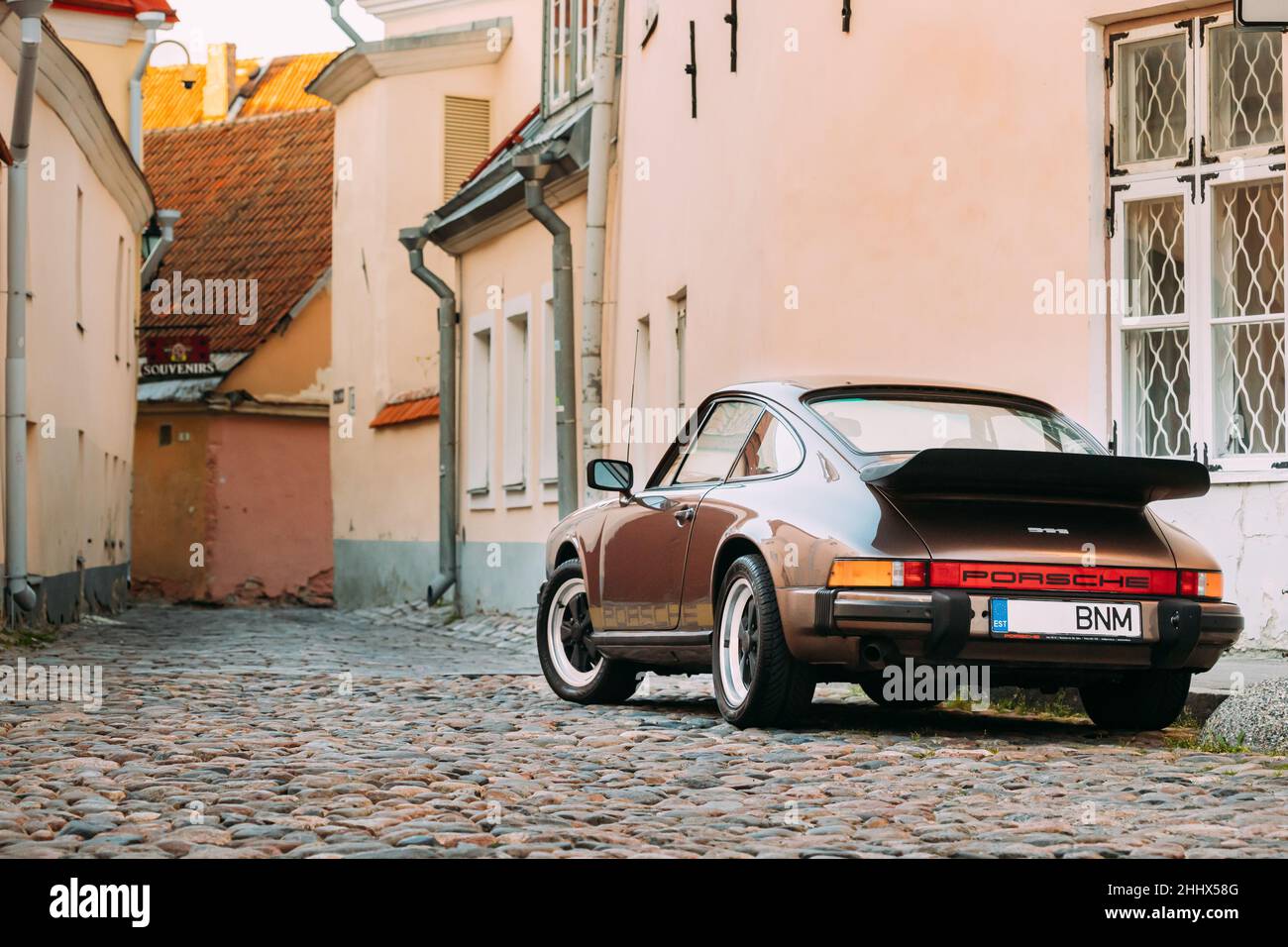 Side View Of Porsche 930 Car Parked In Old Narrow Street Stock Photo ...