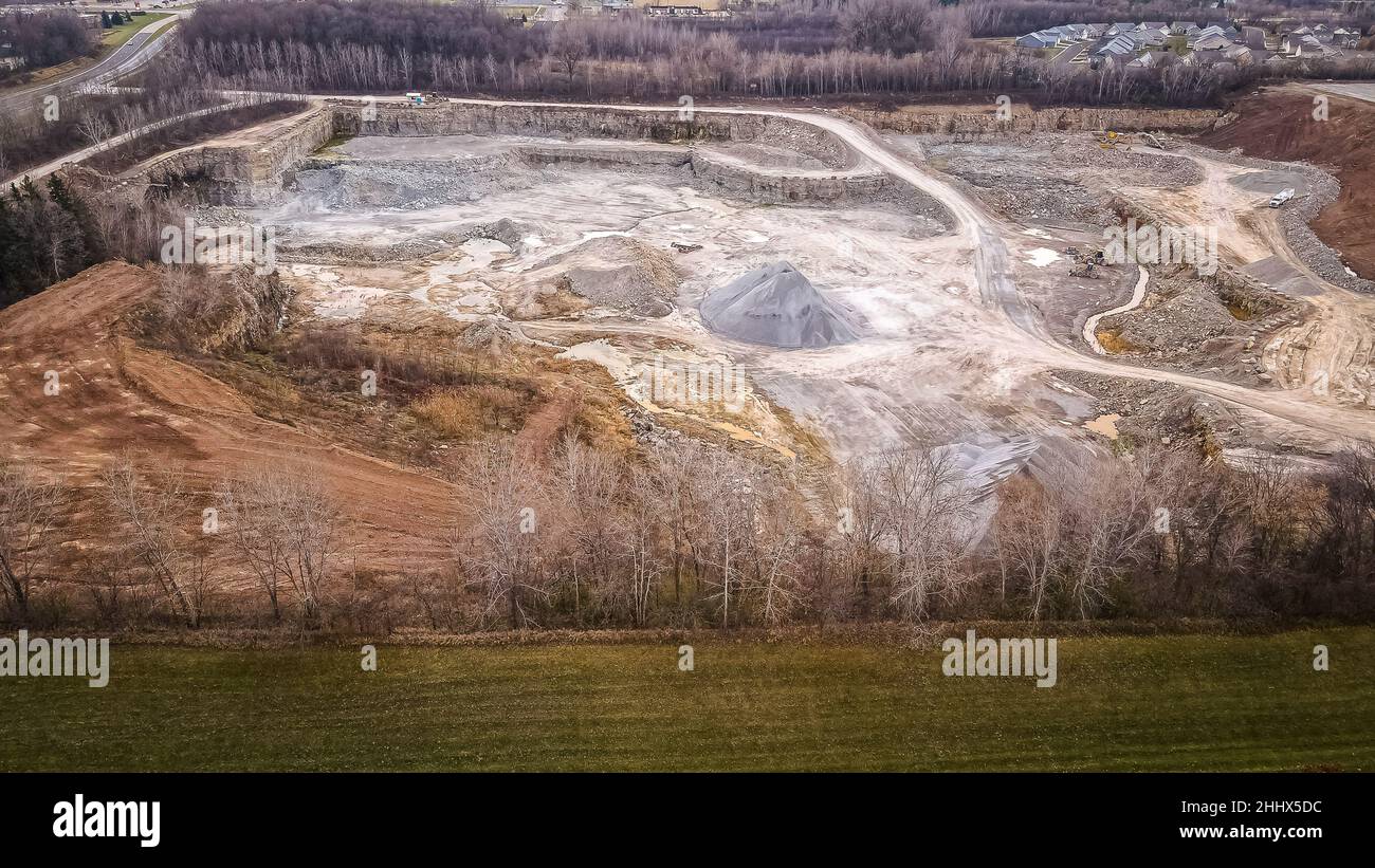 Open pit rock quarry with piles of stones and gavel Stock Photo - Alamy