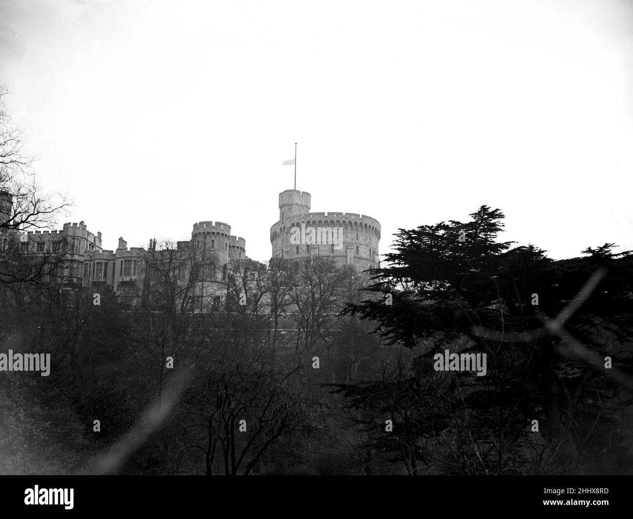 View of Windsor Castle, Berkshire, with the flag at half mast following ...
