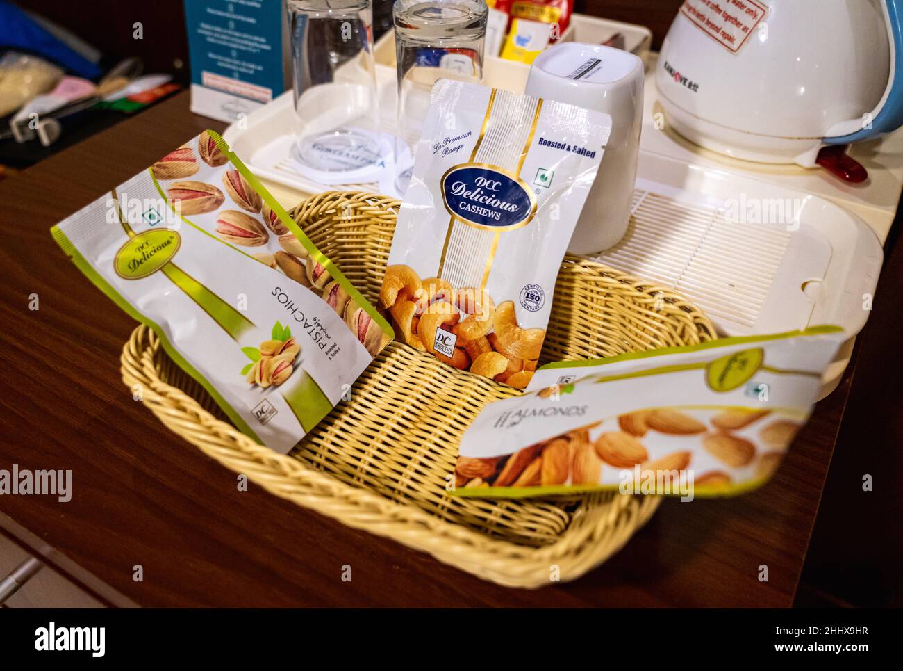 A packet of cashews, pistachios and almonds on a snack basket at a ...