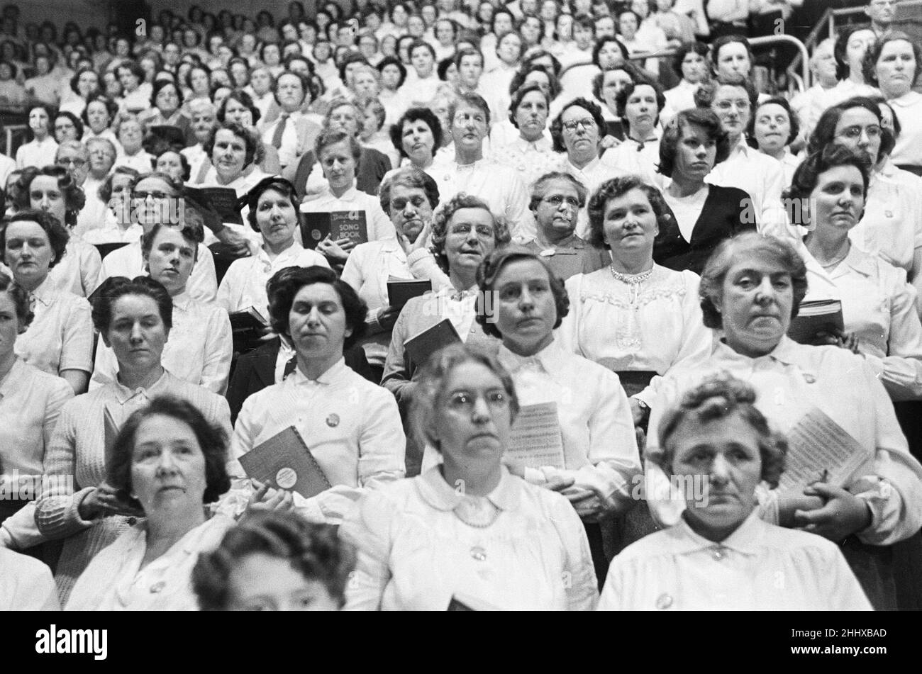 American evangelist Billy Graham speaks to the crowd at the Harringay ...