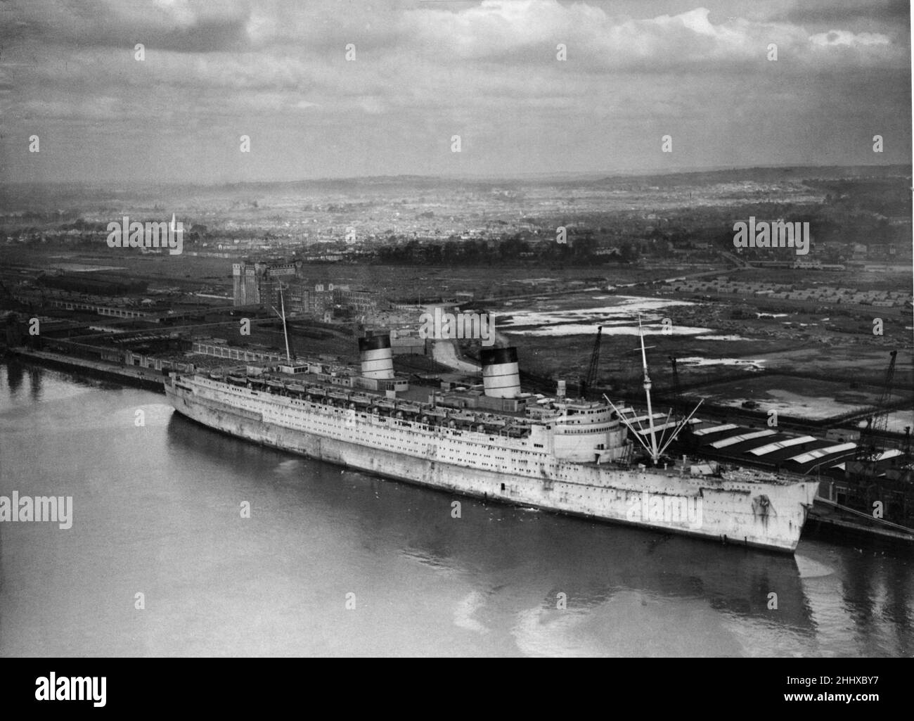 RMS Queen Elizabeth seen here lying againt berth 101 in Greenock at the ...