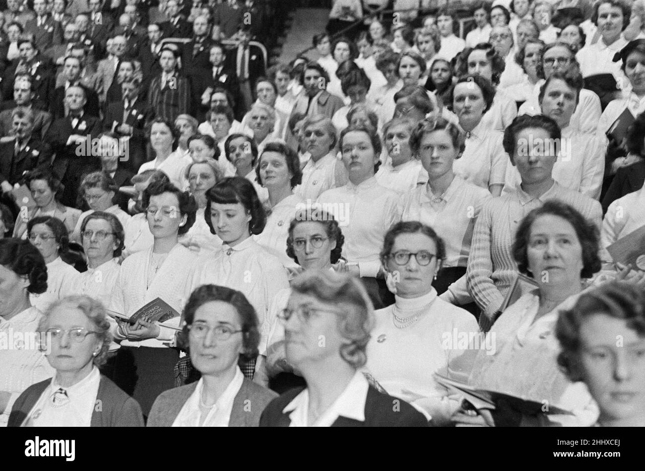 American evangelist Billy Graham speaks to the crowd at the Harringay ...