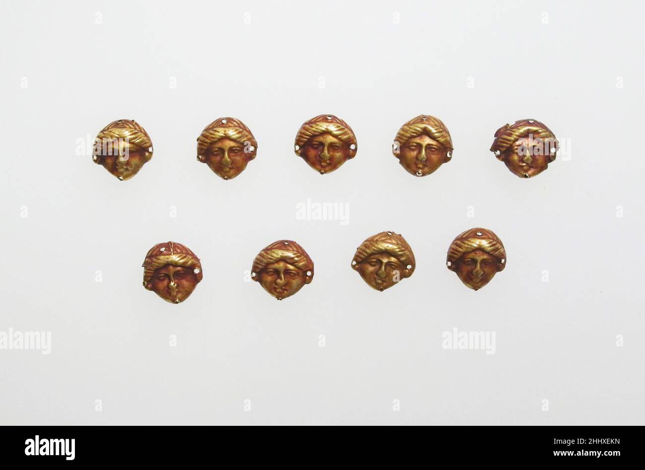 Bead ornaments in the form of female head 6th–5th century B.C. Greek ...