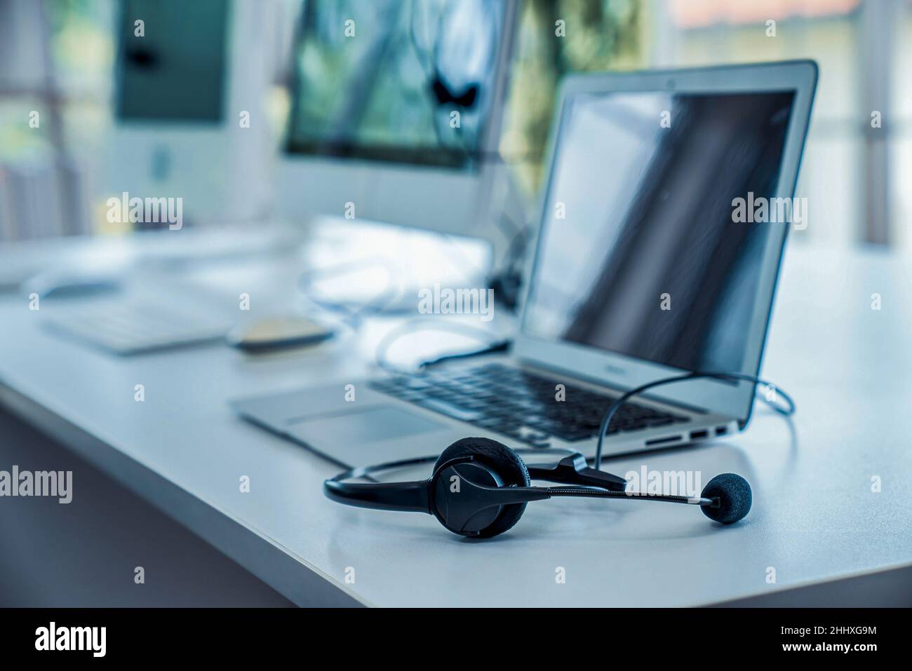 Headset and customer support equipment at call center ready for ...