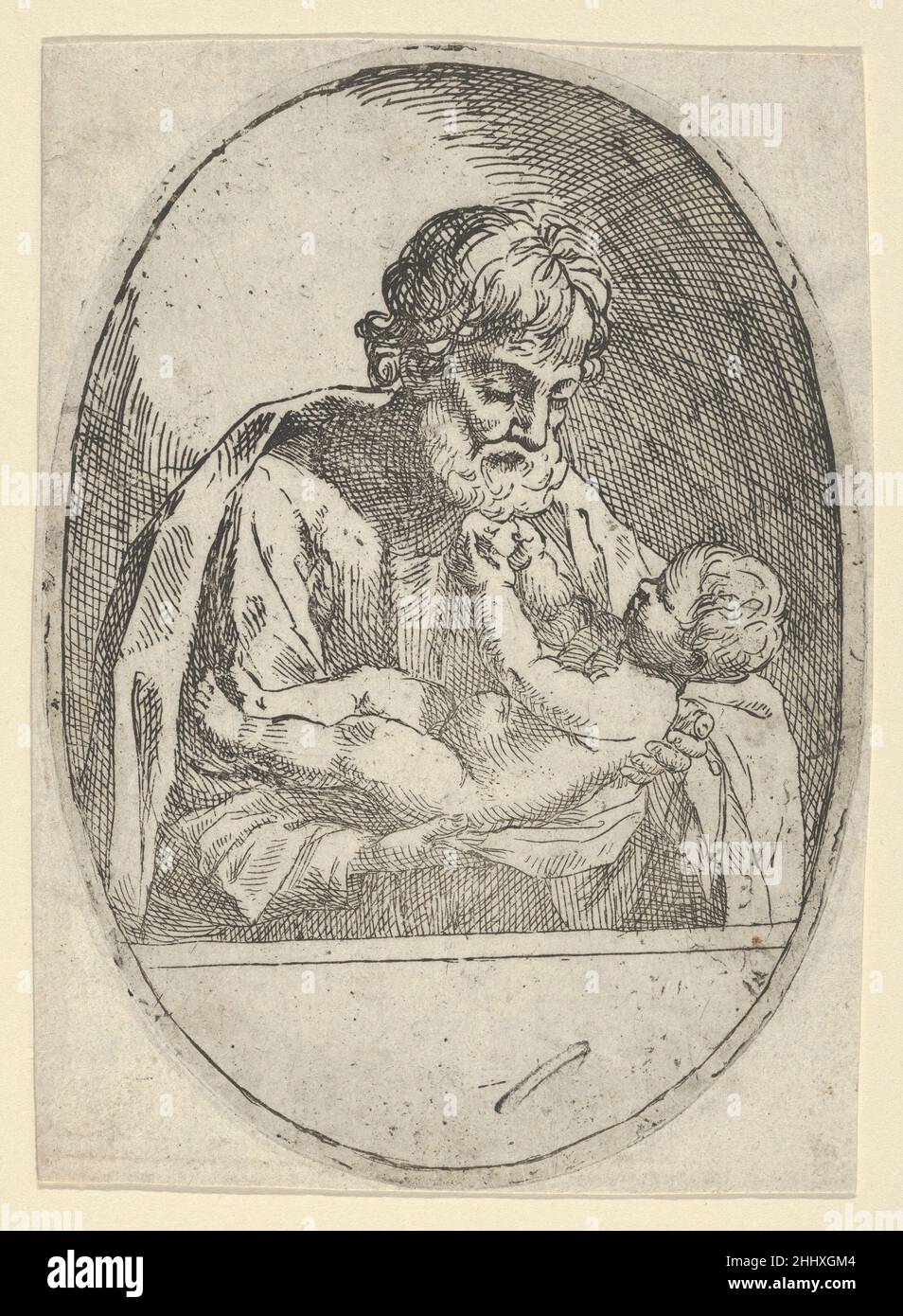 Saint Joseph holding the infant Christ, who raises up his hands, an ...