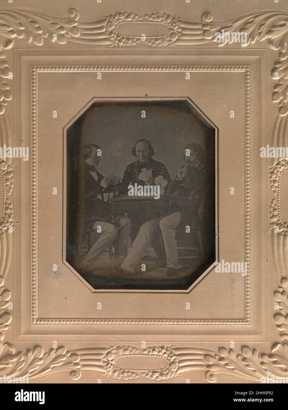 Three men playing cards hi-res stock photography and images - Alamy