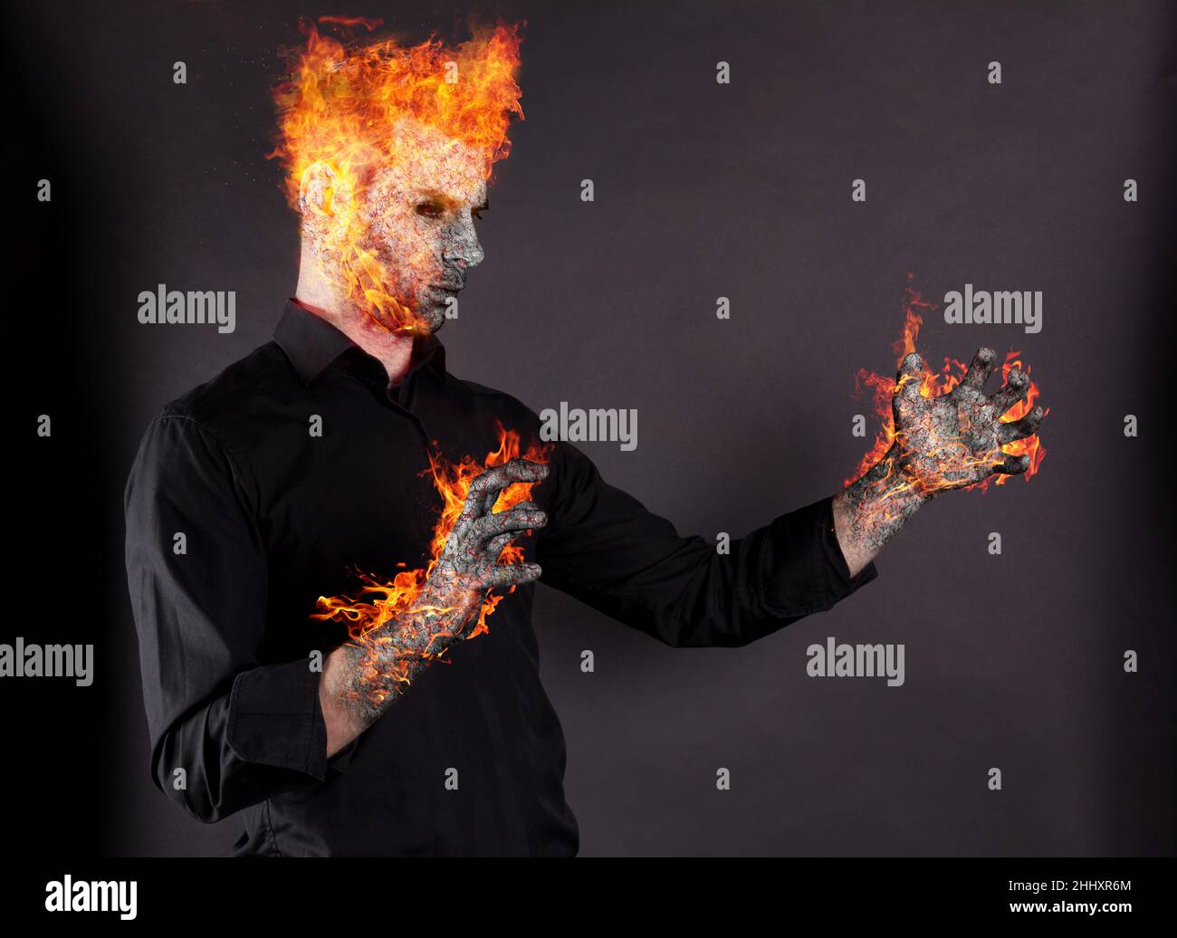 Man transforming, hands and face glowing and burning - Concept of power ...