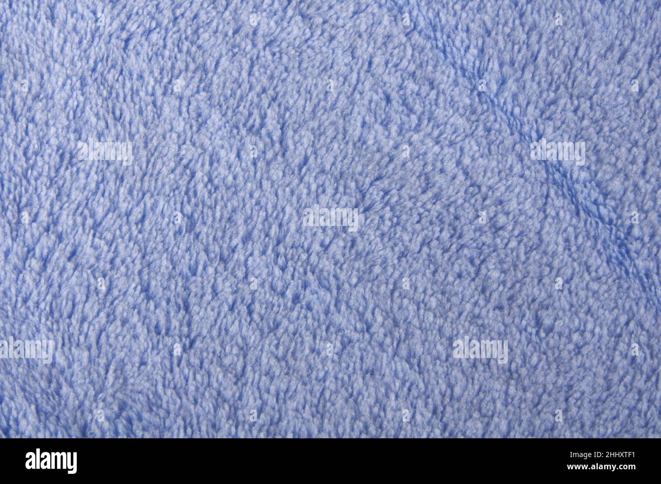 Blue fabric fluffy material texture background Stock Photo - Alamy