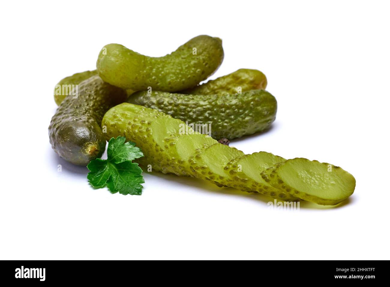 Tasty Whole green cornichons isolated on a white background Stock Photo ...