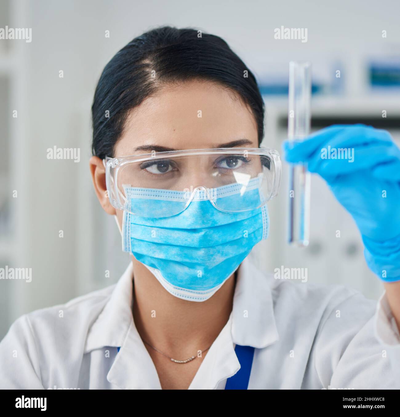 The maestro in modern medicine. Shot of a young scientist conducting an ...