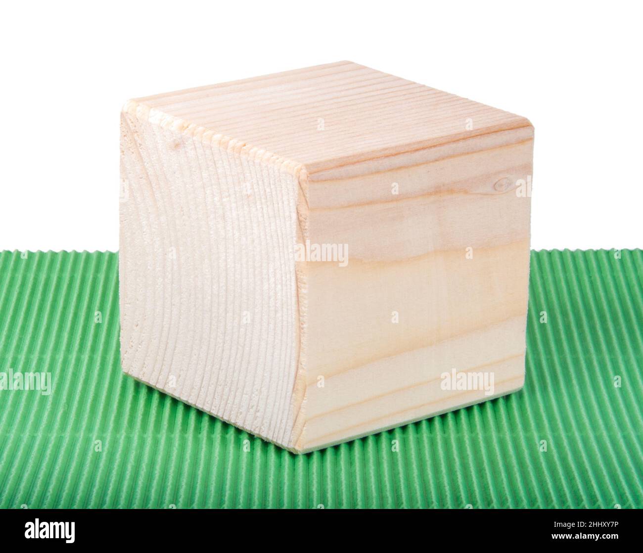 Wooden square brick cubic isolated on the white on green Stock Photo ...