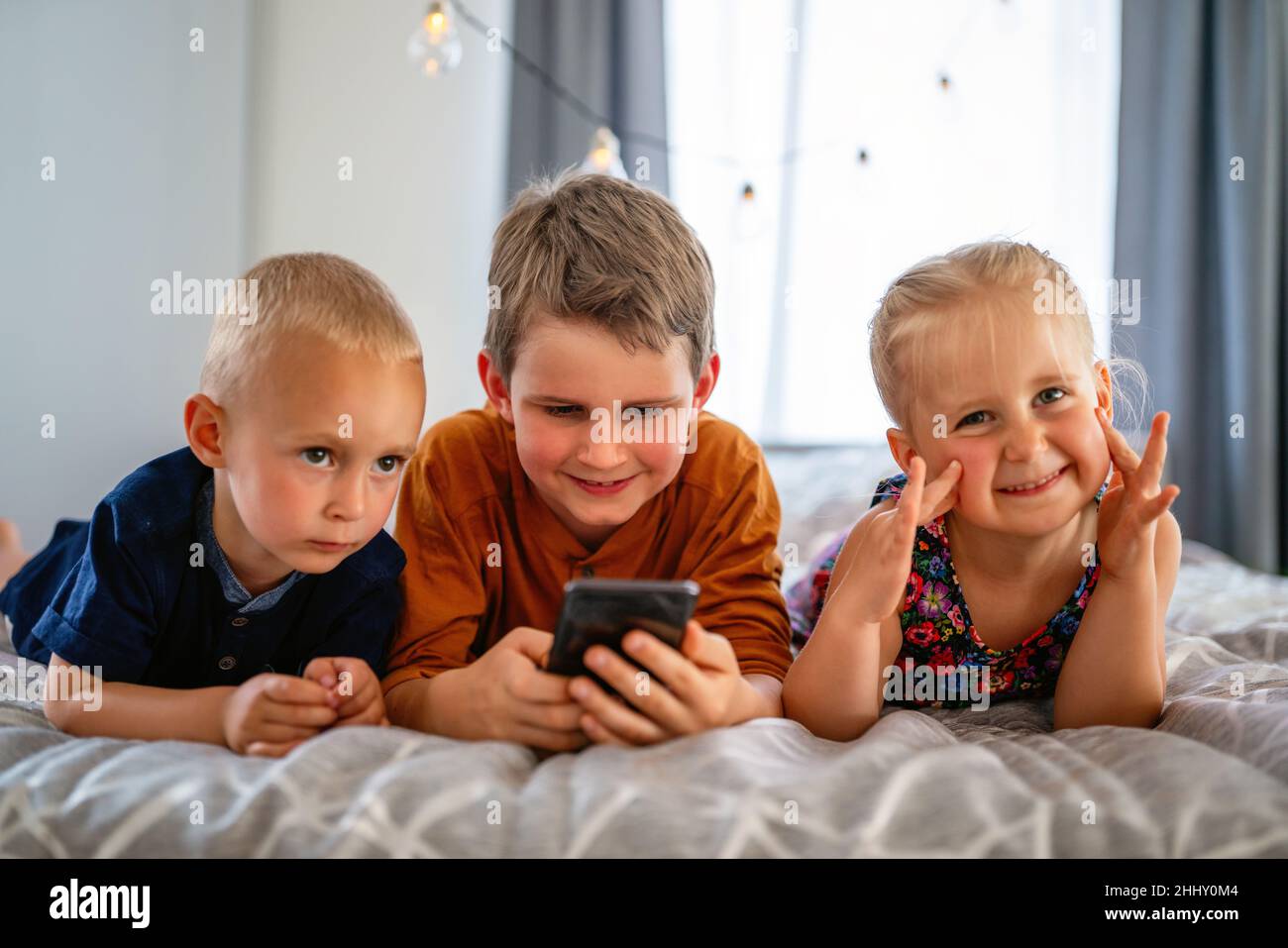Childhood technology kids smartphone concept. Happy little children ...
