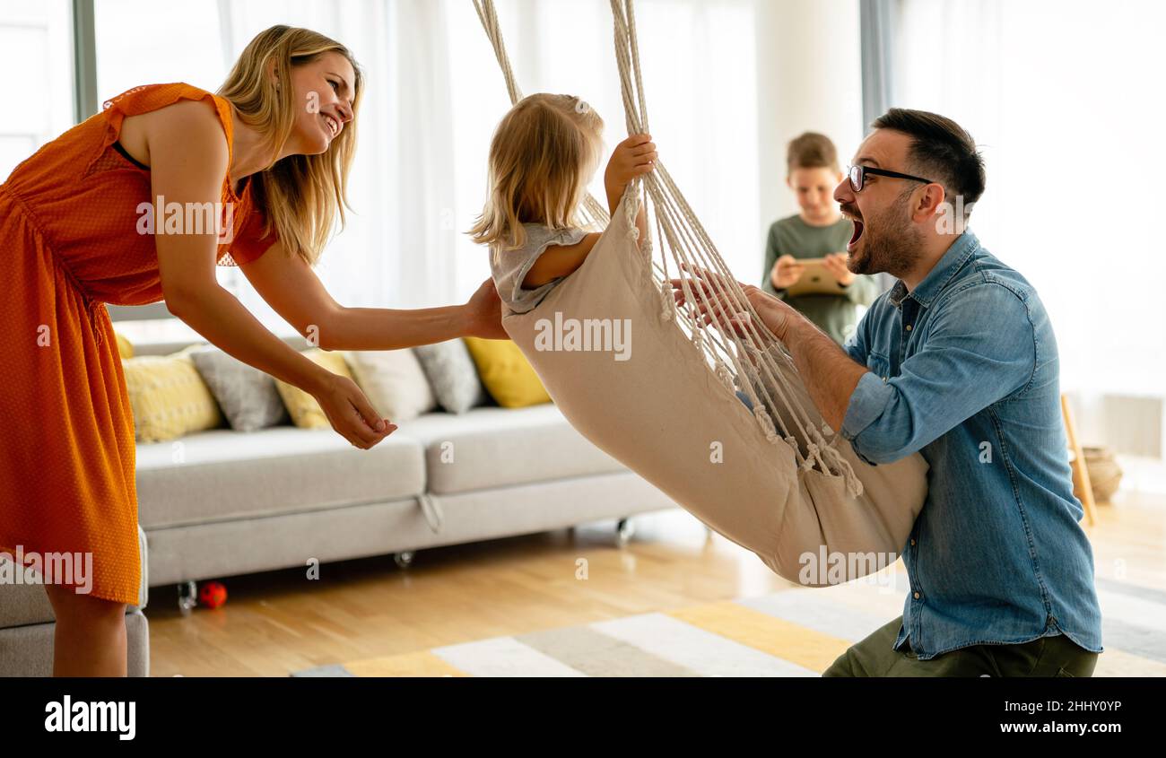 Happy family having fun and spending time together at home Stock Photo ...