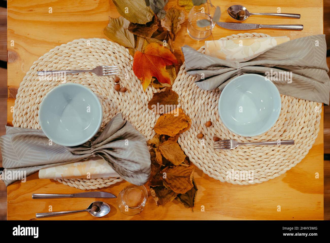 Flat lay of autumn-themed table setting for a birthday celebration at a ...