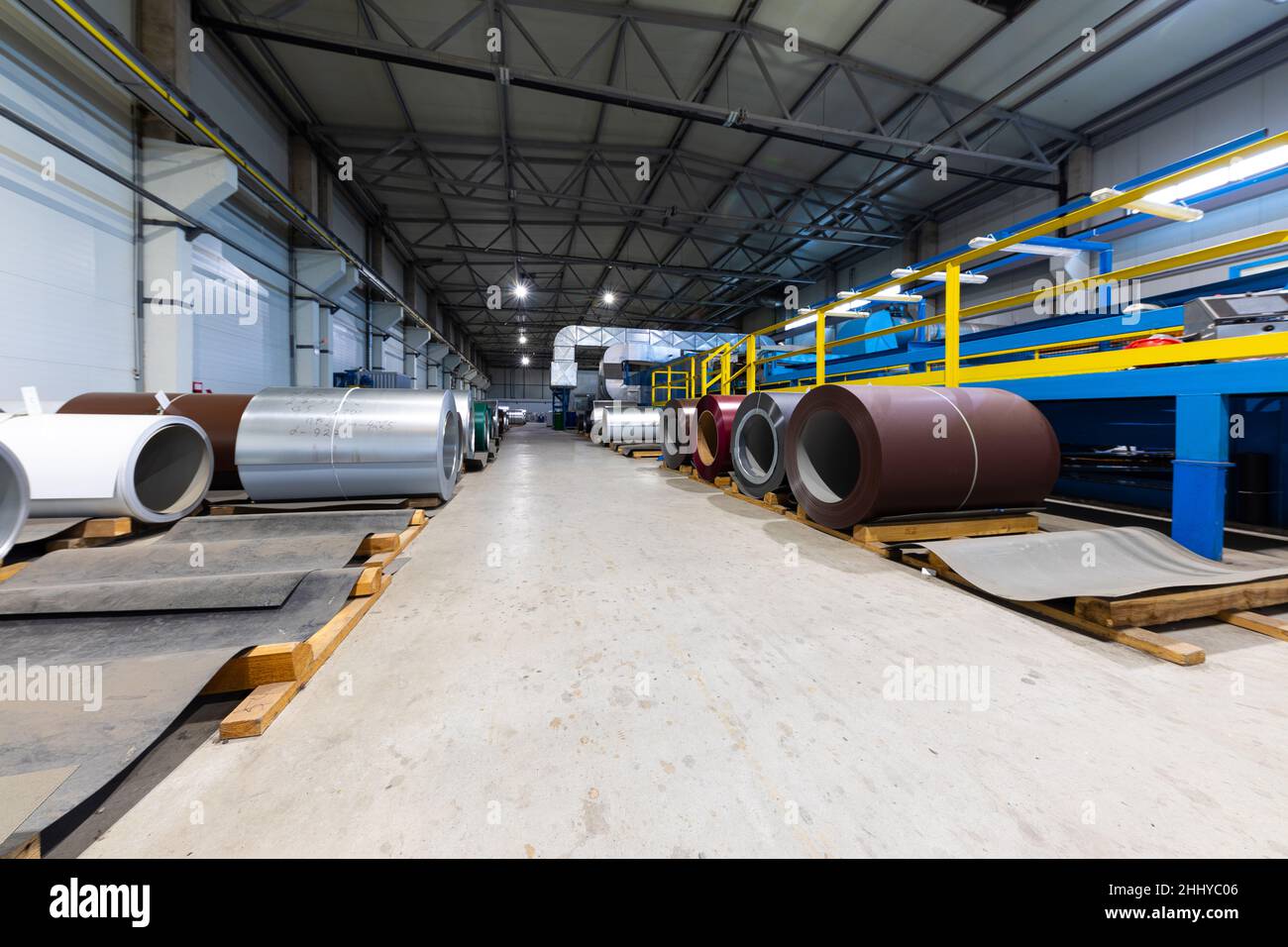 Production line of metal tile for roof. Steel forming machine in ...