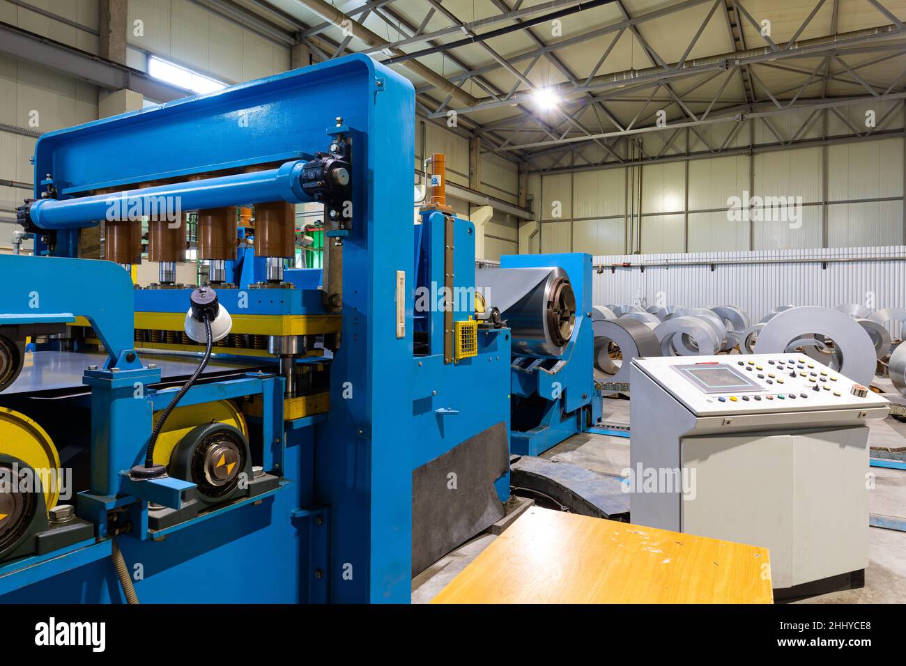 Photo of steel roofing forming machine. Industrial machine for metal ...