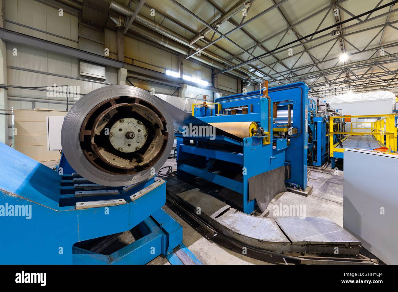 Photo of steel roofing forming machine. Industrial machine for metal ...