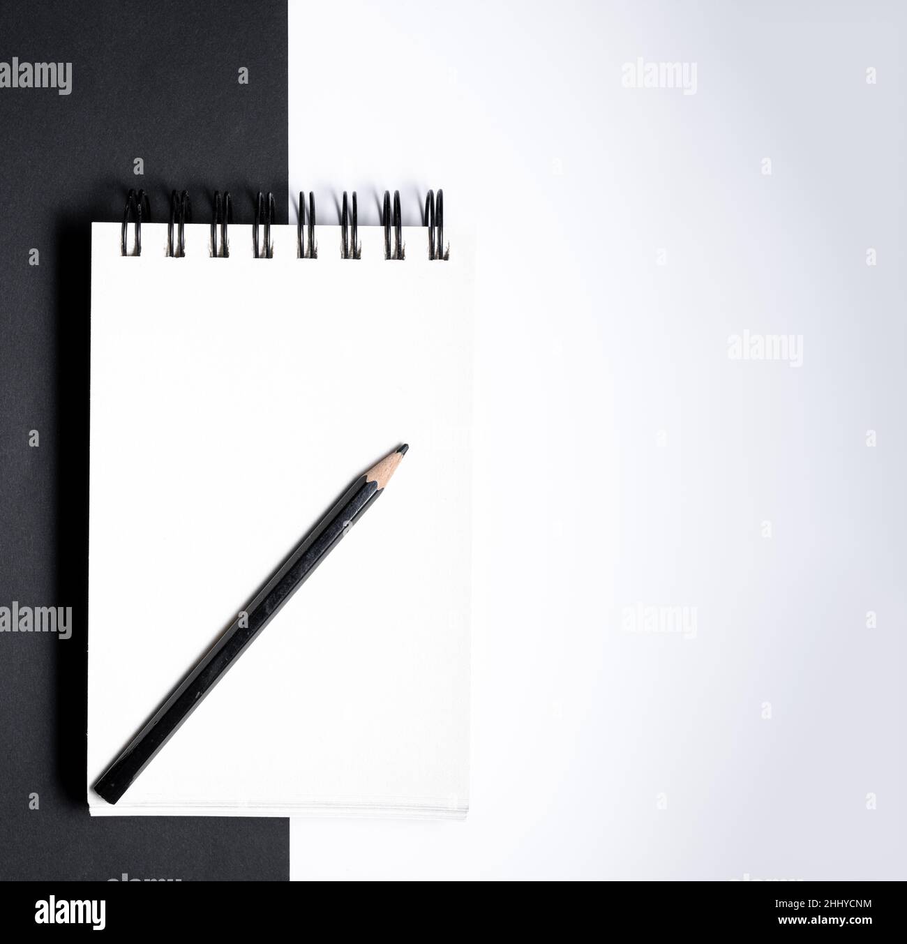Spiral binder notebook mock up on black and white background. concept ...