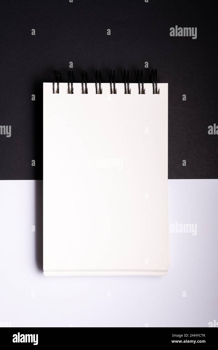 Spiral binder notebook mock up on black and white background. concept ...