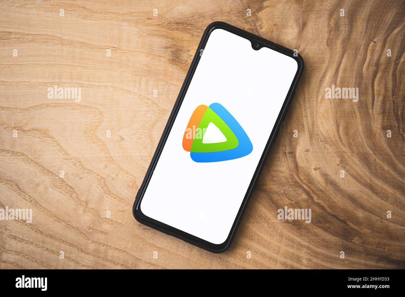 Tencent video application on smartphone. Top angle shot. Tencent Video ...